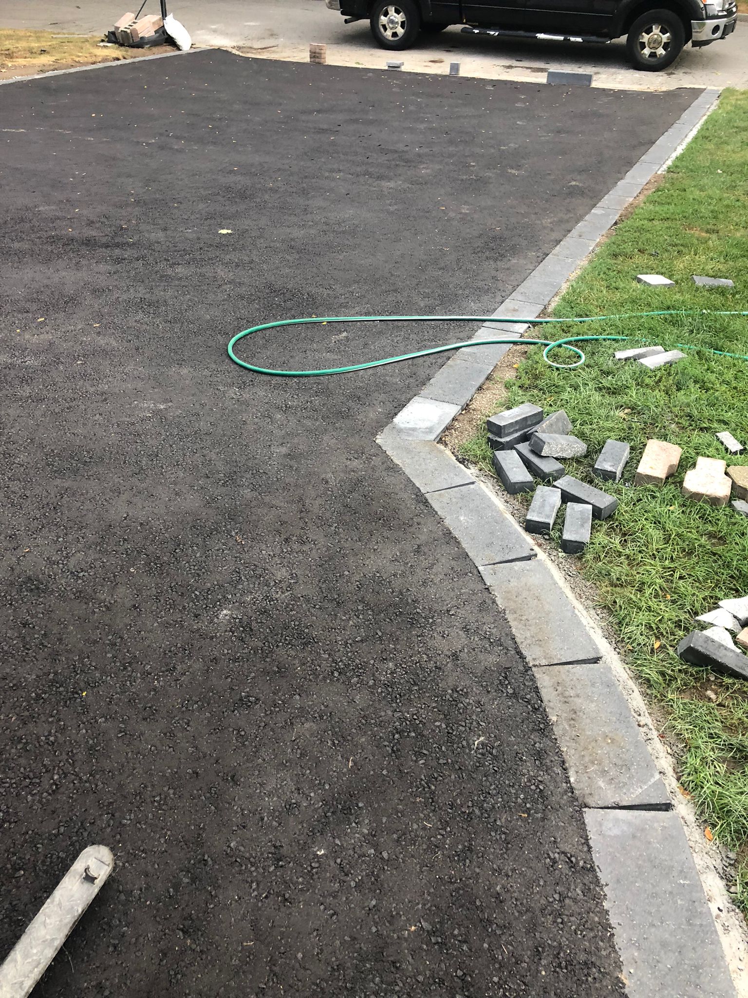 Paved Driveway With Interlock Border and Steps - Expert Paving and Masonry